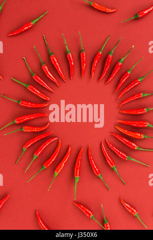 Flat lay composition with chili peppers and spices Stock Photo - Alamy