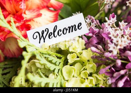 Fresh flowers bunch and card with words thank you written on it Stock ...