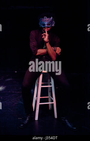 Young actor performing on stage Stock Photo - Alamy