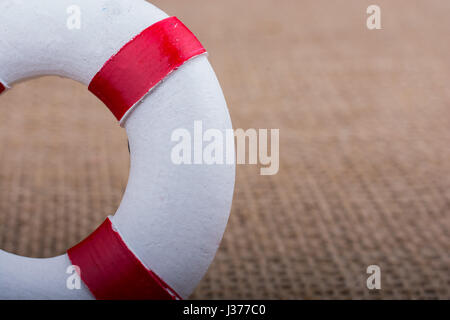 Lifesaver or life preserver on a fabric background Stock Photo - Alamy