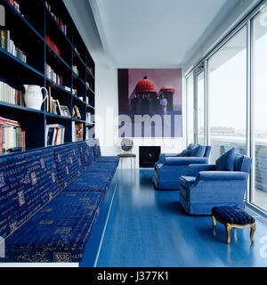 Modern library interior with blue chairs Stock Photo - Alamy