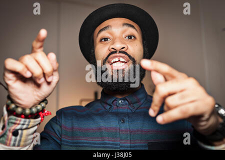 Profile portrait of young african american man against isolated white ...