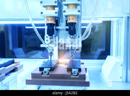 atuomatic screw feeder in cell phone assembly equipment factory Stock ...
