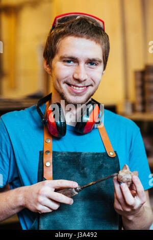 happy carpenter is enjoying his work Stock Photo - Alamy