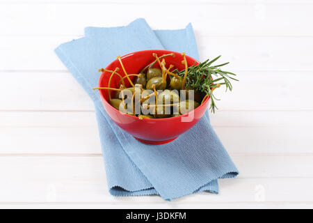 bowl of pickled caper berries with stems on Stock Photo - Alamy