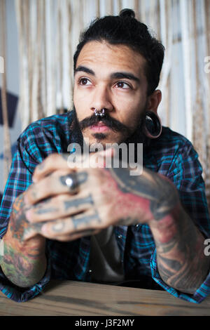 Heavily tattooed man Stock Photo - Alamy
