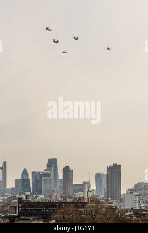 Military Helicopters flying over the city of London and St James's Park ...