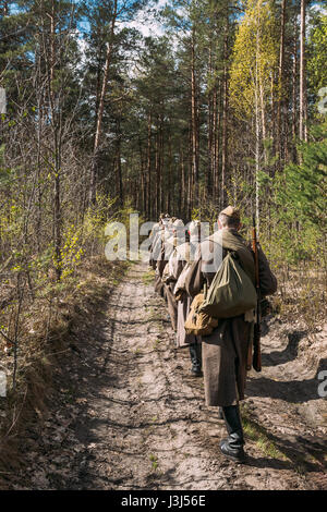 World War II re-enactors dressed as a Soviet border guard, right, and a ...