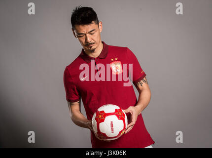 Portrait of Chinese soccer player Zeng Cheng of Guangzhou Evergrande ...