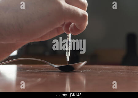 Drugs preparation begore use under studio lights Stock Photo - Alamy