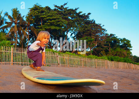 Surfer boy hawaii Stock Photo - Alamy