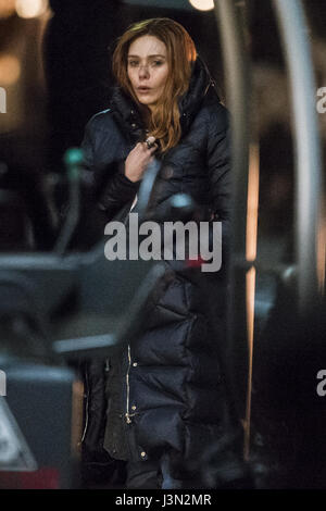 Elizabeth Olsen feels the cold as she films scenes for upcoming movie ...