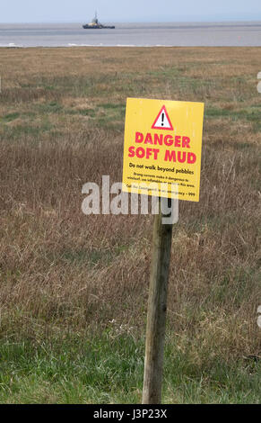 Danger Soft Mud warning sign on the beach Stock Photo - Alamy