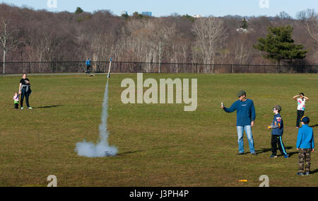 Cub Scout launching a model rocket at Millennium Park, Boston Stock ...