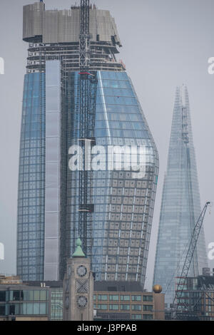 The Oxo Tower & a high-rise residential building with a building crane ...