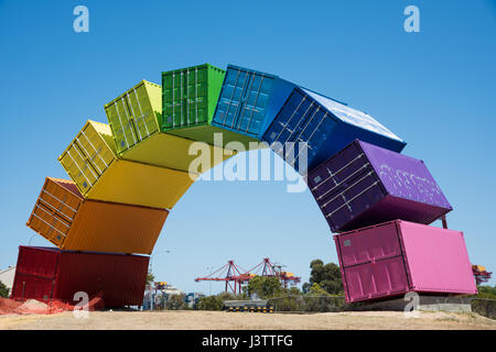 Rainbow shipping container sculpture by Marcus Canning on beach reserve ...