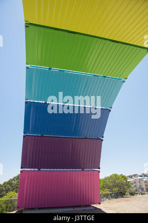 Rainbow shipping container sculpture by Marcus Canning on beach reserve ...