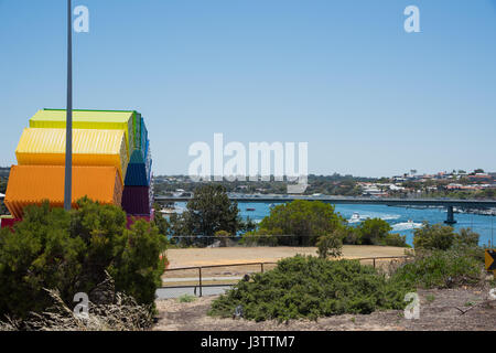 Rainbow shipping container sculpture by Marcus Canning on beach reserve ...