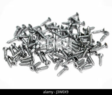 short screws isolated on white background Stock Photo - Alamy