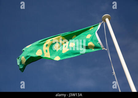 Flag flying above Oakham Castle in Rutland which is still used as a ...