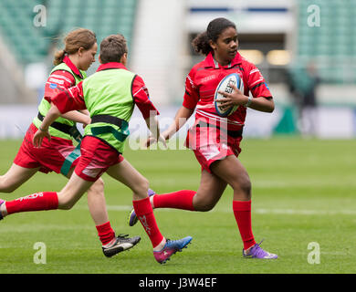 Teams of children playing tag rugby Stock Photo - Alamy