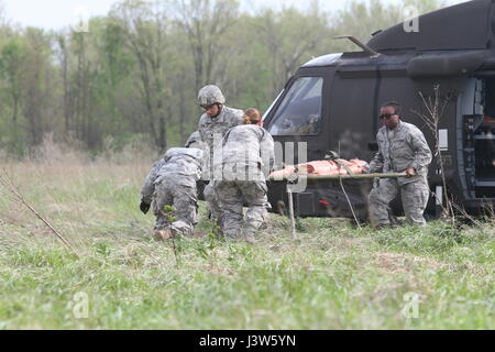 U.S. Army Reserve Spc. Flores Garcia, 176th Medical Brigade, walks upto ...