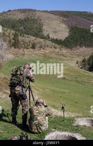 A Serbian Special Anti-Terrorist Unit officer runs to the first station ...