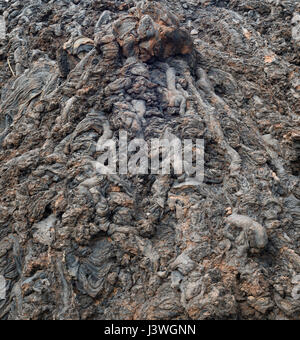 Detail of vertical section of pahoehoe or ropy lava on cliff face near ...