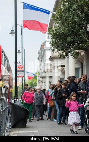 Voters queue at a polling station in Mandalay, Myanmar, on Jan. 11 ...