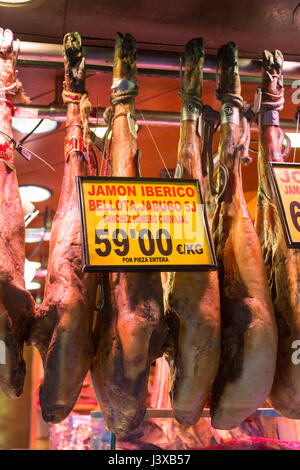Iberico ham display at La Boqueria, Barcelona, Spain Stock Photo - Alamy