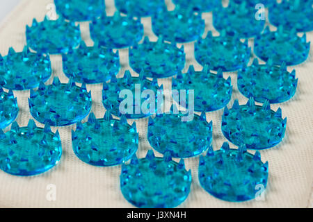 Orthopedic mat with sharp spikes Stock Photo - Alamy