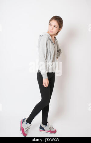 Beautiful slim girls wore sport isolated on a white background Stock ...