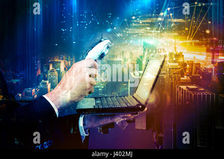 Businessman look with magnifying glass at the computer screen Stock ...
