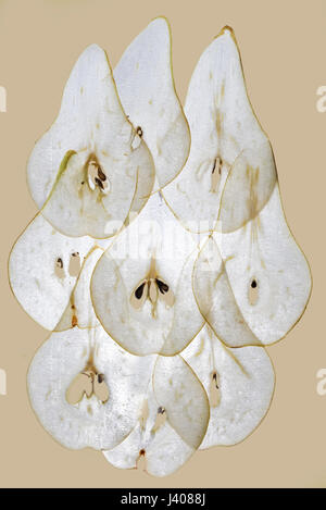 Fresh pear with a juicy slice on a white background Stock Photo - Alamy