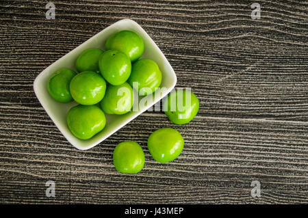 Sour green plum, the most wonderful and mouth watering sour plums Stock ...