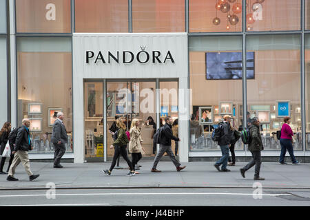People walking by Pandora along Broadway in SOHO, New York City Stock ...