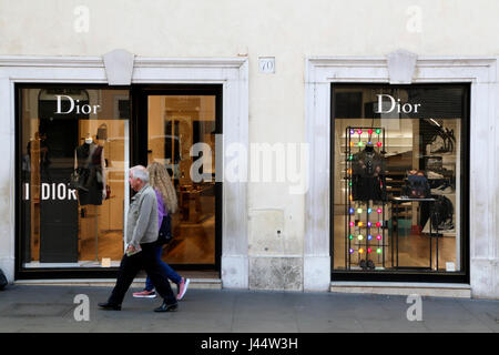 Pedestrians walk past of a Dior store at Piazza di Spagna, Rome Italy ...