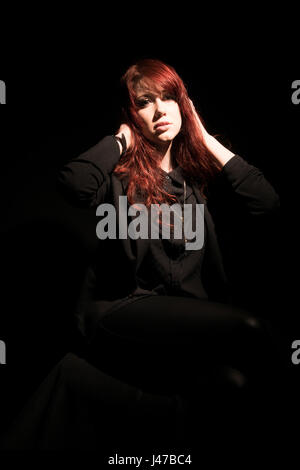 Low key portraits, female Stock Photo - Alamy