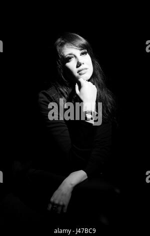 Low key portraits, female Stock Photo - Alamy