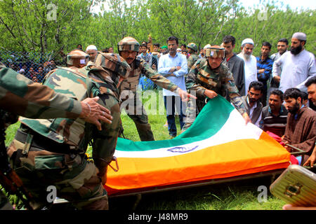An Indian army cover coffin with Indian flag during wreath lying ...