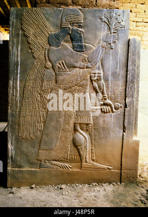 Relief with protective spirit (winged genius). From Assyrian North-West ...
