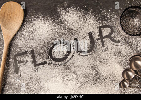 Handwritten word drawn in the flour - Create Stock Photo - Alamy