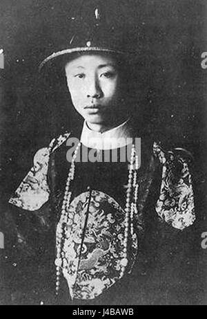 The last emperor of China Pu Yi sitting on the throne at the age of ...