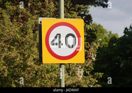 40 mph sign, forty miles per hour painted on the road Stock Photo - Alamy