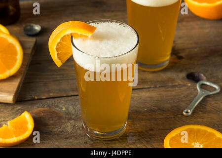 Organic Orange Citrus Craft Beer with a Garnish Stock Photo - Alamy