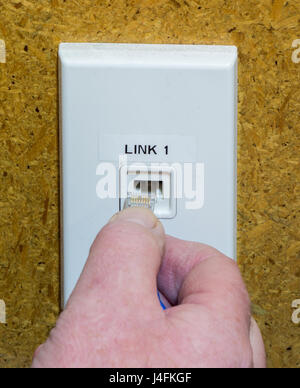 Wired wall network link connection point Stock Photo - Alamy