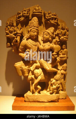 This sculpture depicts the Hindu deities Shiva and Parvati in a ...