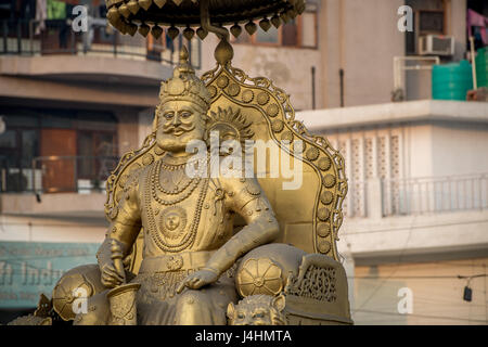 A gold statue of an Indian god is proudly displayed in downtown Agra ...