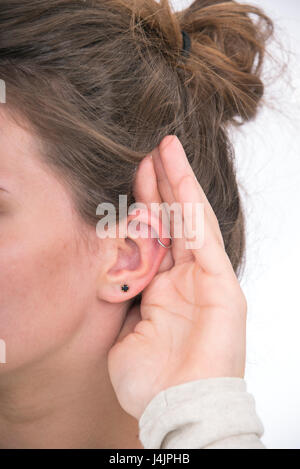 listening with cupped hand Stock Photo - Alamy