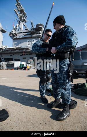 NORFOLK, Va. (March 8, 2017) Sailors aboard the aircraft carrier USS ...